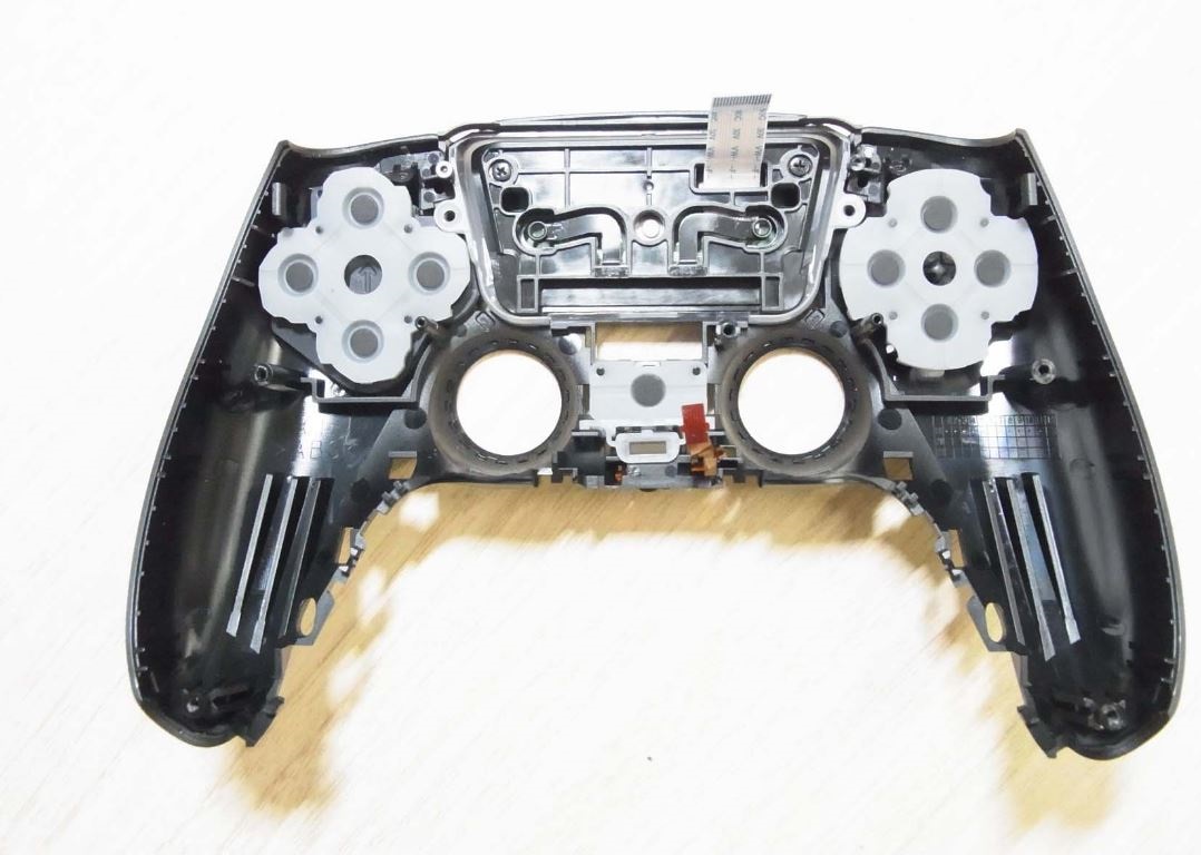 索尼PS5的DualSense无线手柄拆机照曝光：展示内部构造_凤凰网