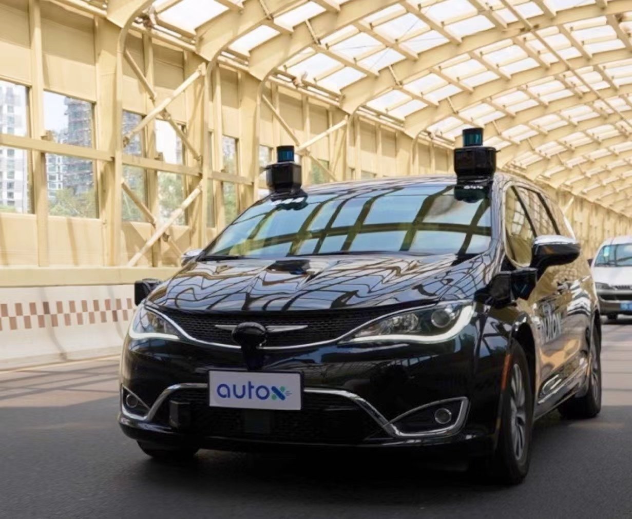 上海第一个市中心城区RoboTaxi示范应用载人服务对外公开运营｜钛快讯_凤凰网