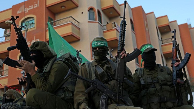 哈马斯数百名战斗人员在加沙城游行 该组织领导人公开露面_凤凰网