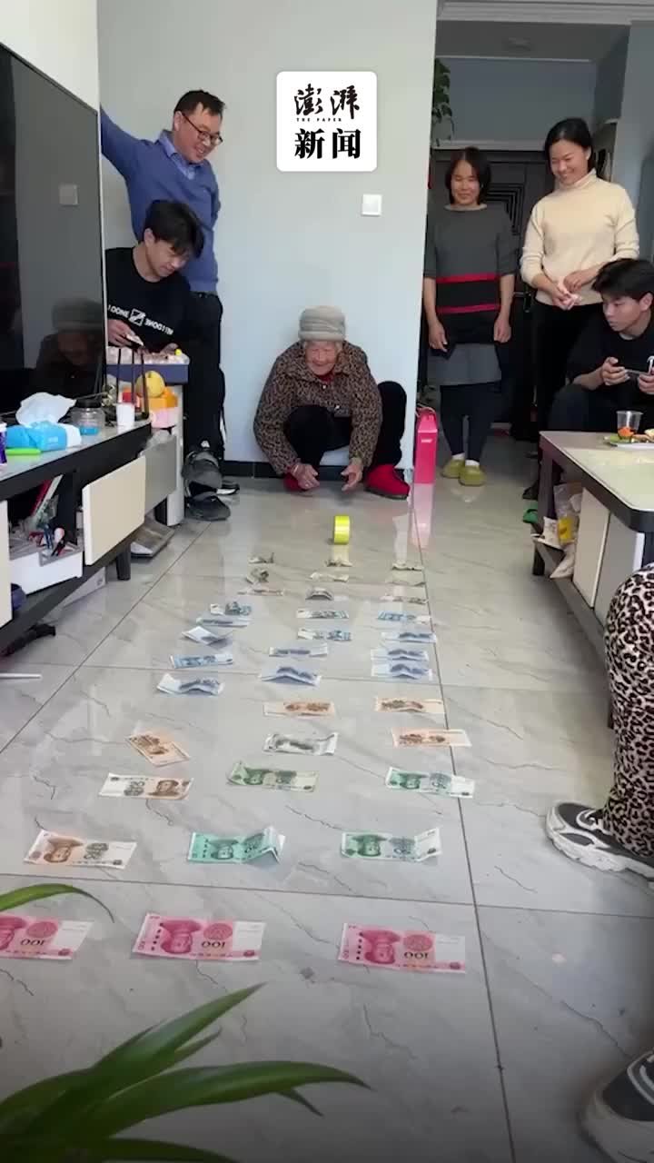 奶奶玩 滚钱”游戏,孙子违规操作帮她粘百元现金凤凰网视频凤凰网